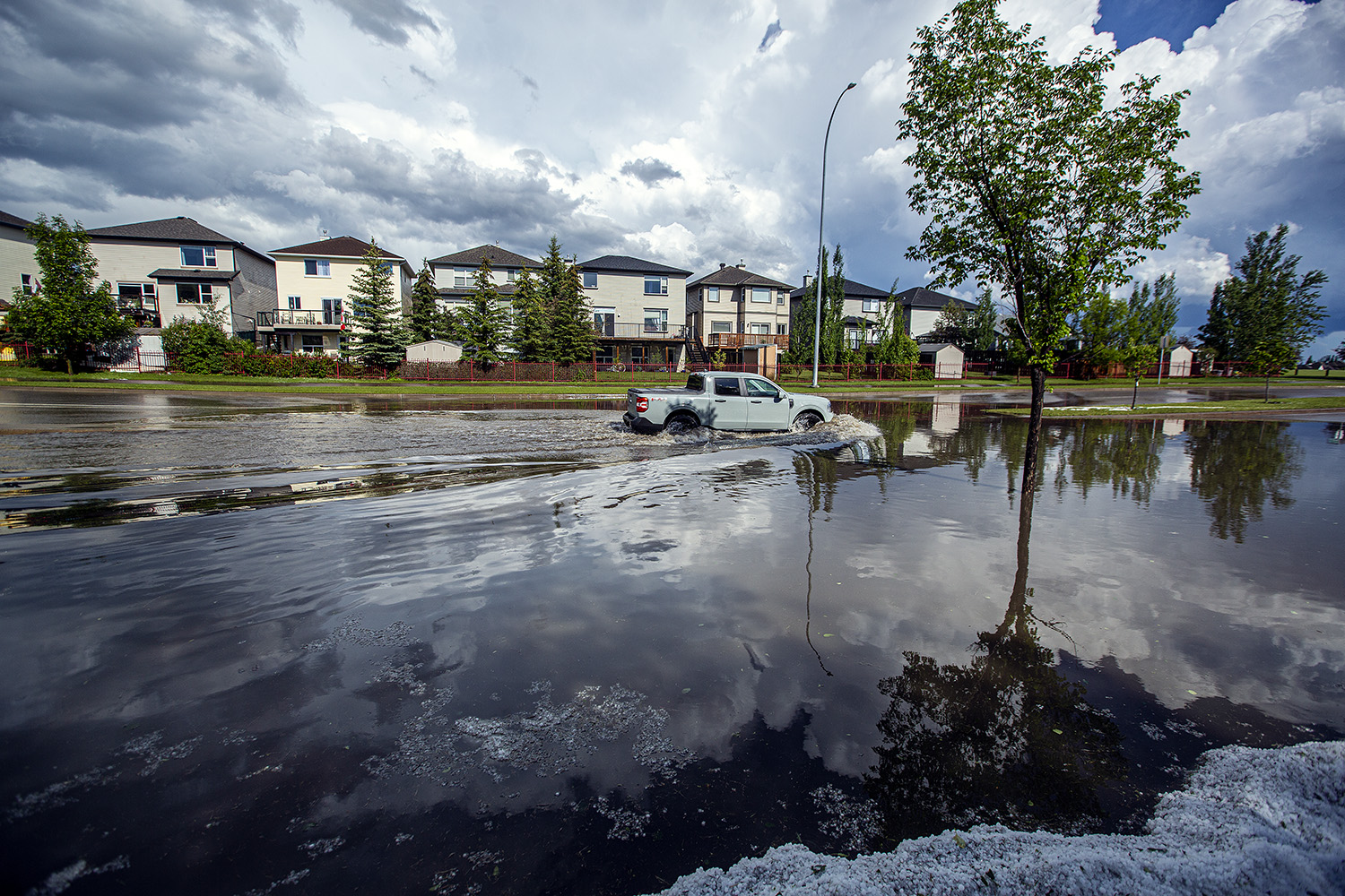 Photos: Heavy rainfall causes storm flooding in northwest Calgary ...
