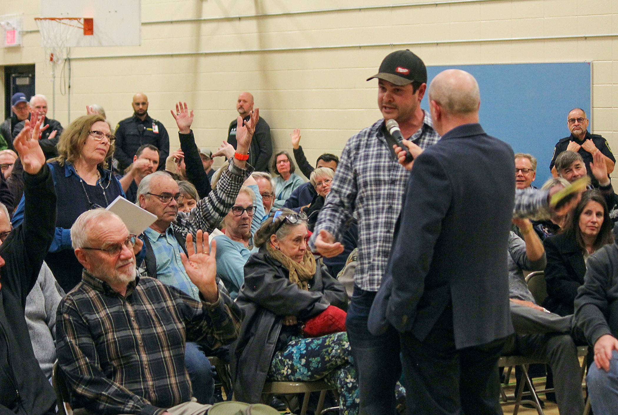 Irate residents pack south Calgary gym for citywide rezoning town hall ...