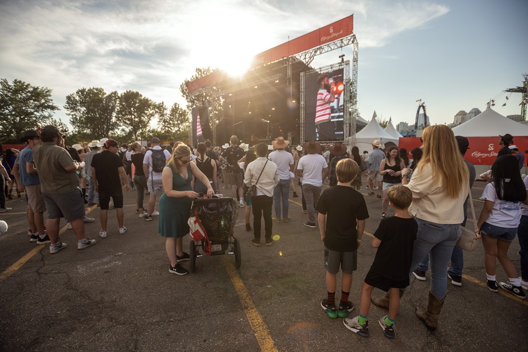 Photos: Stampede goers brave heat for night four on park - LiveWire Calgary