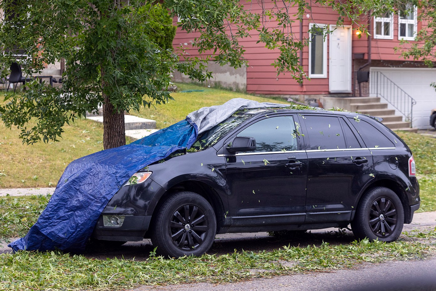 Hail storm batters Calgary with egg-sized hail, damage across northwest ...